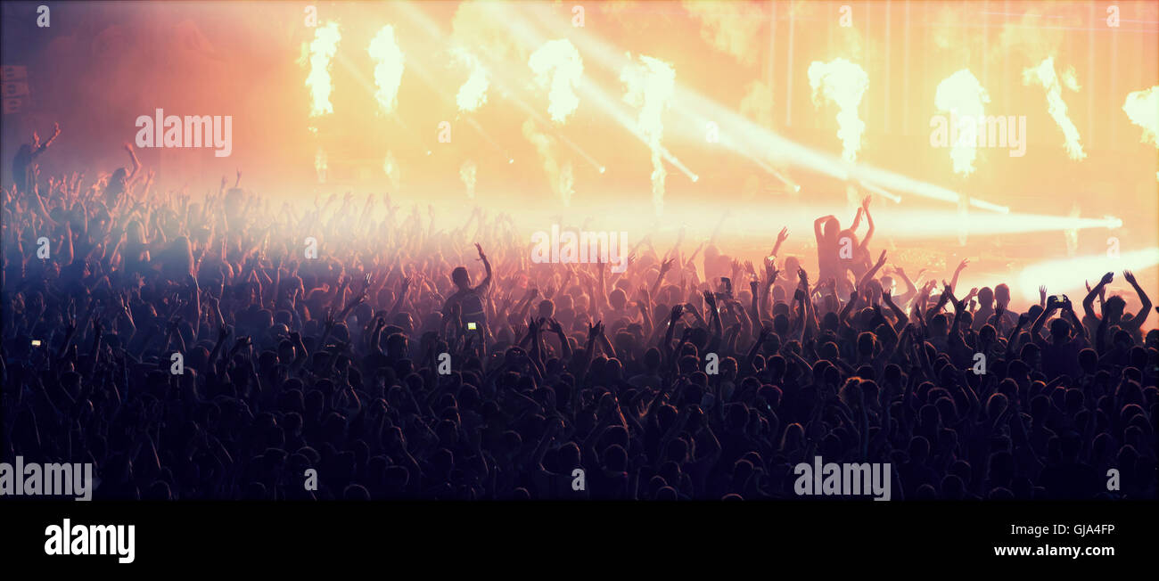 Crowd at concert and spectacular stage lights Stock Photo - Alamy