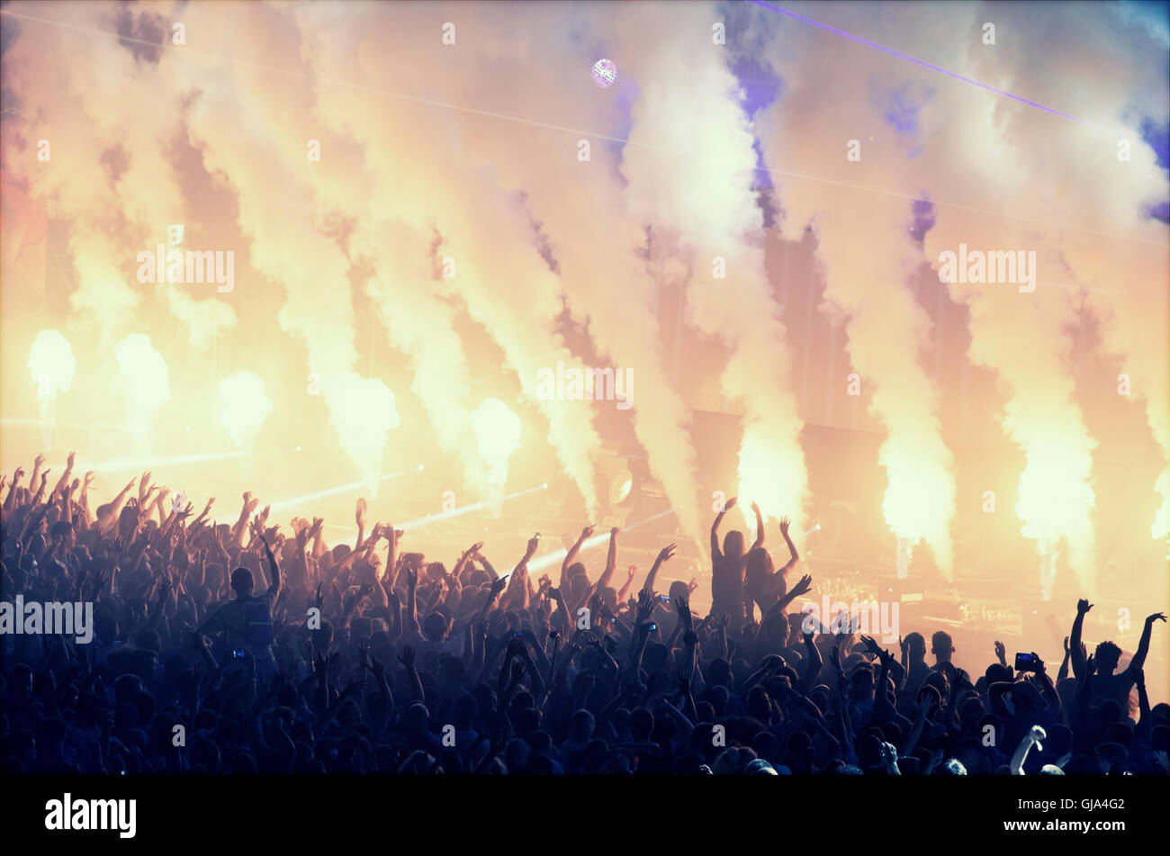 Crowd at concert and spectacular stage lights Stock Photo - Alamy