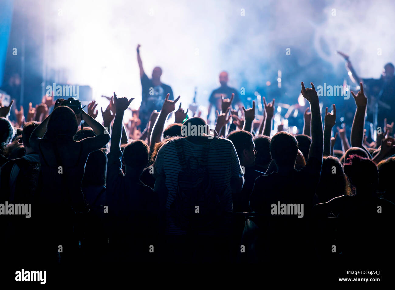 Crowd at concert and spectacular stage lights Stock Photo - Alamy