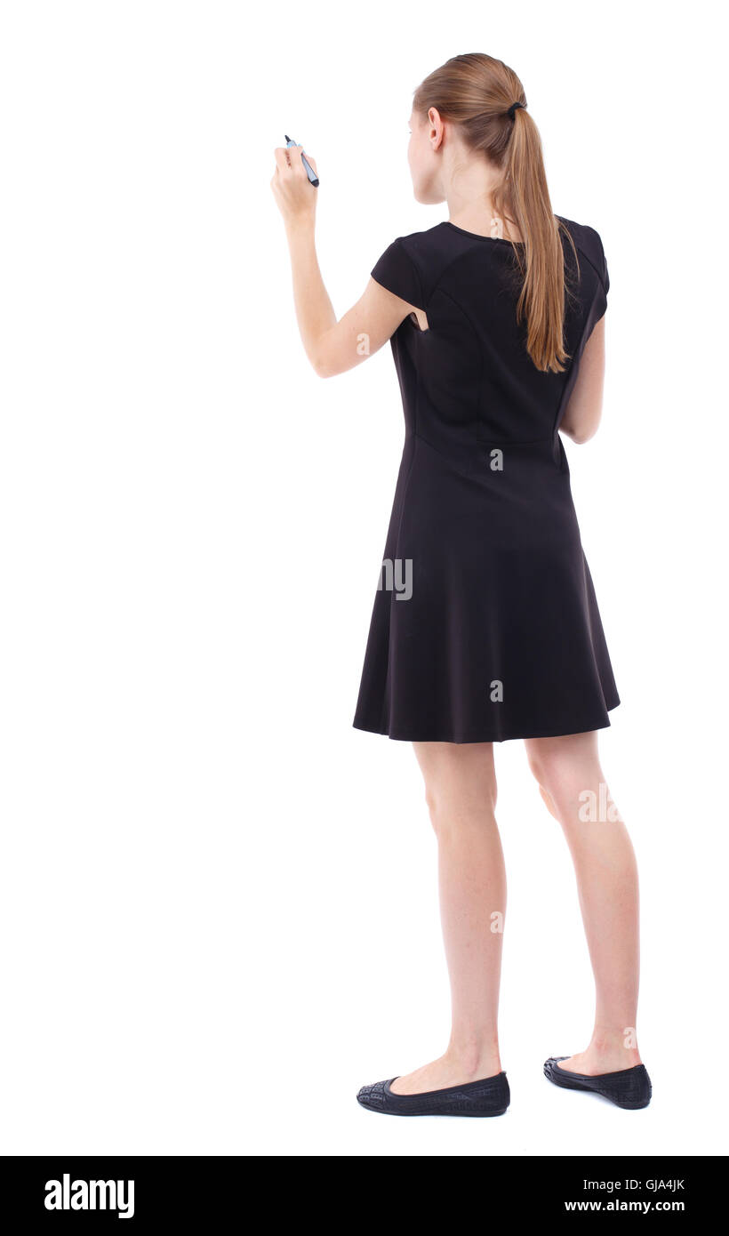 back view of writing beautiful woman. Young girl in dress Stock Photo ...