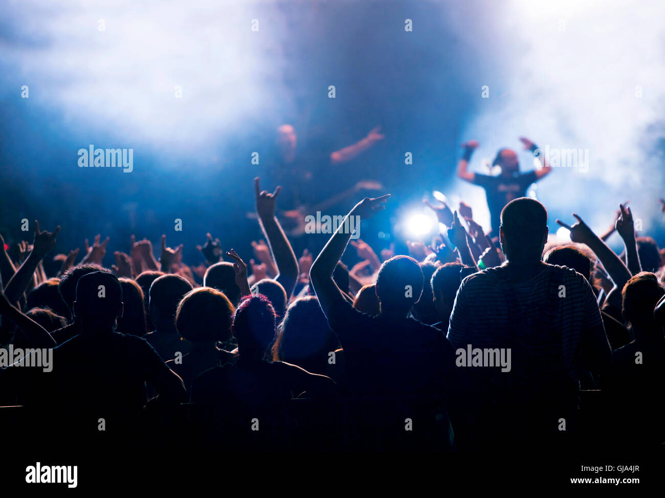 Crowd at concert and spectacular stage lights Stock Photo - Alamy