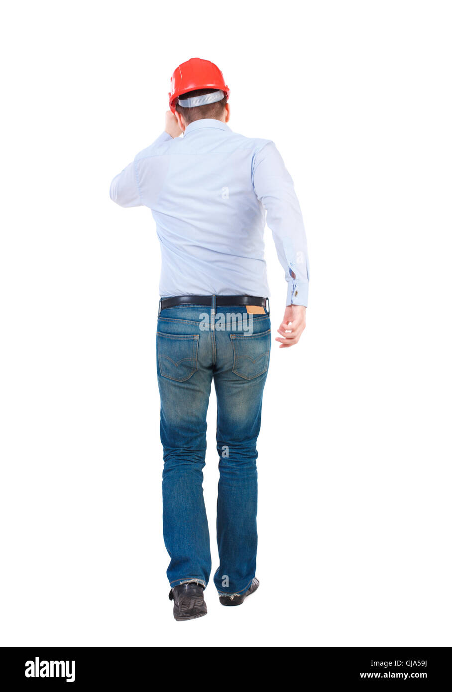 Back view of running engineer in helmet Stock Photo - Alamy