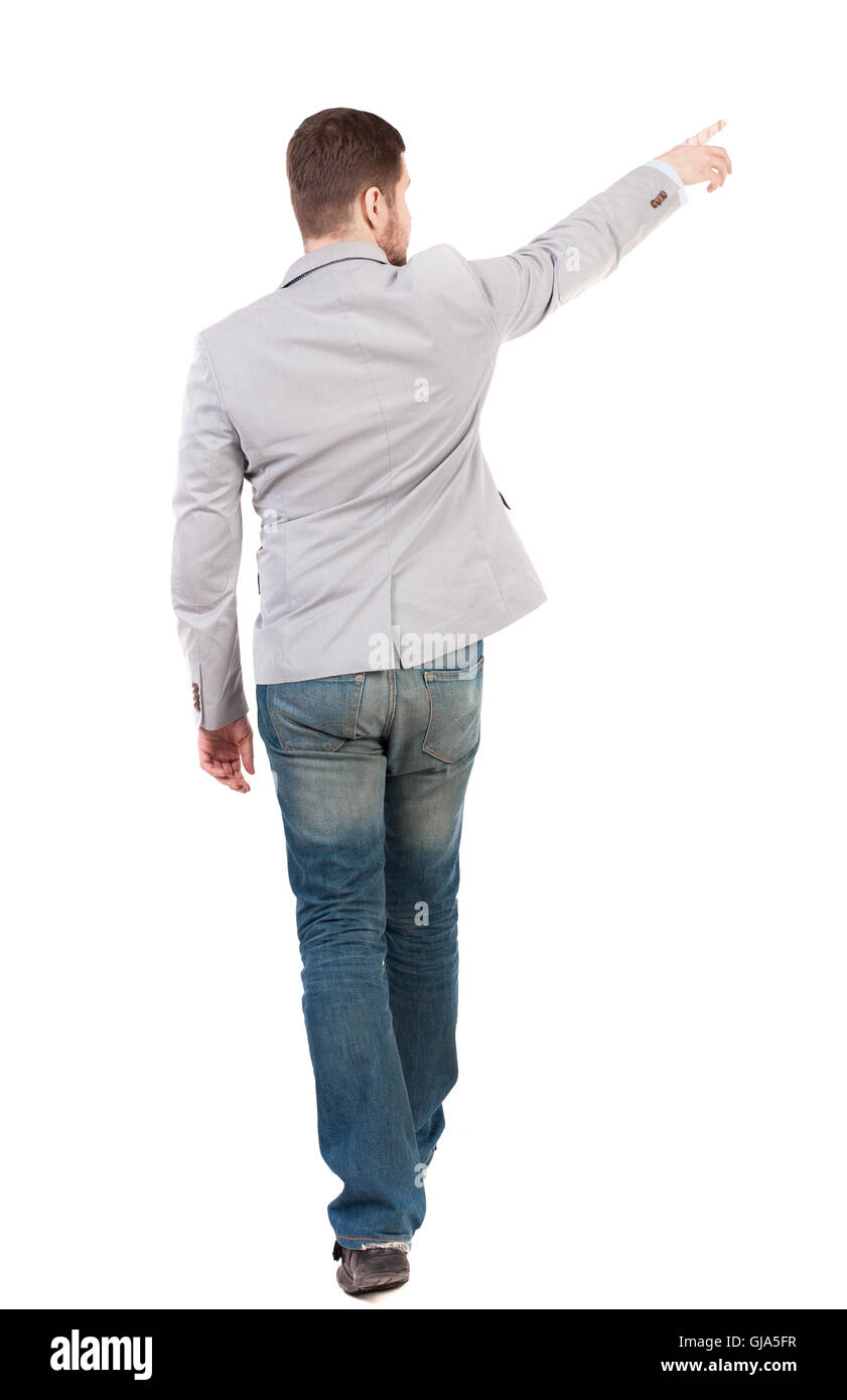 Back view of going business man pointing Stock Photo - Alamy