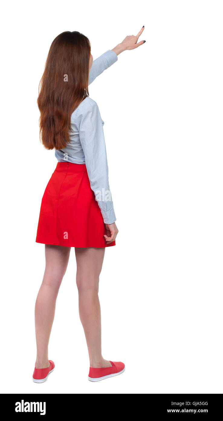 Back view of pointing woman. beautiful girl Stock Photo - Alamy