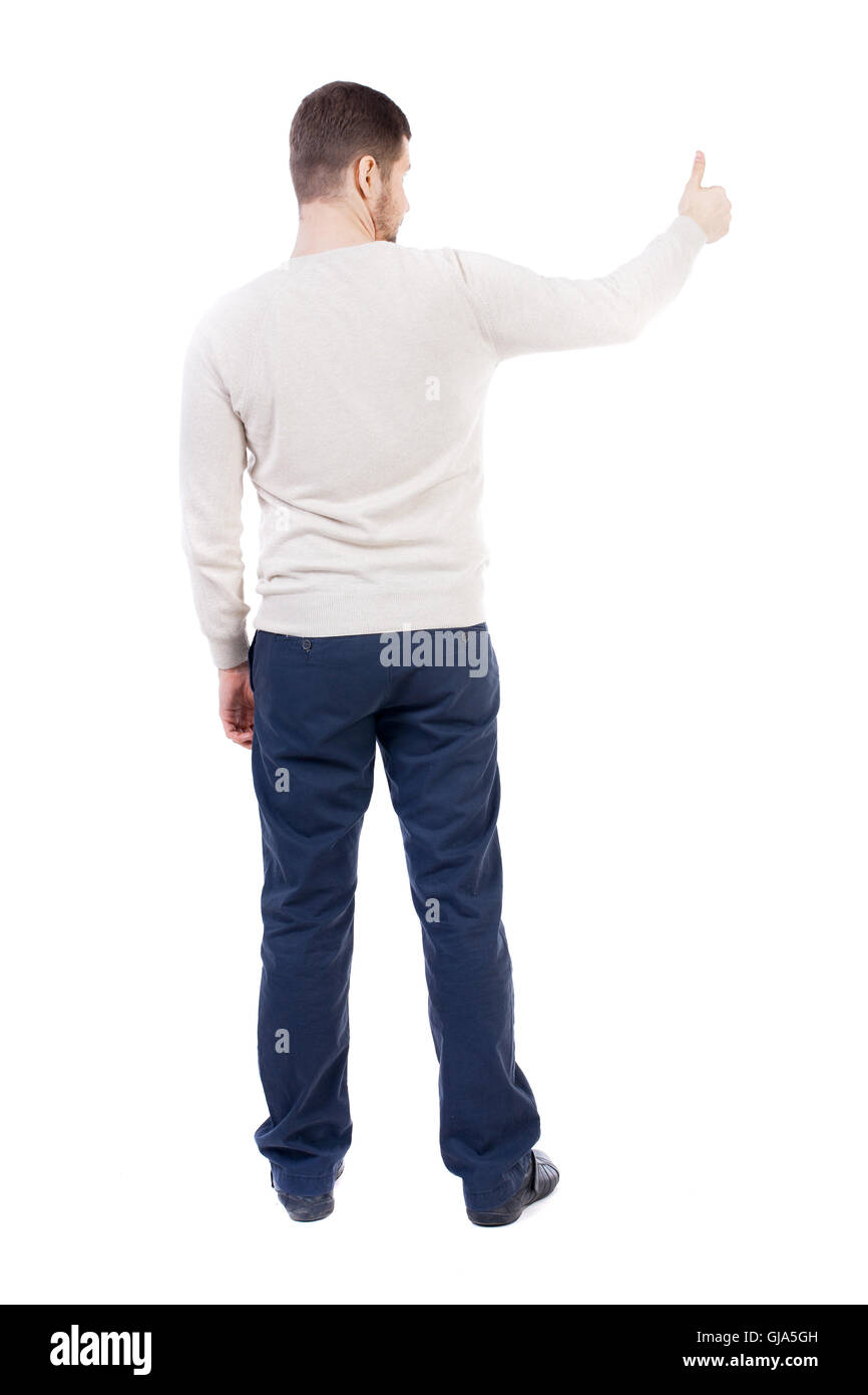 Back view of business man shows thumbs up Stock Photo - Alamy