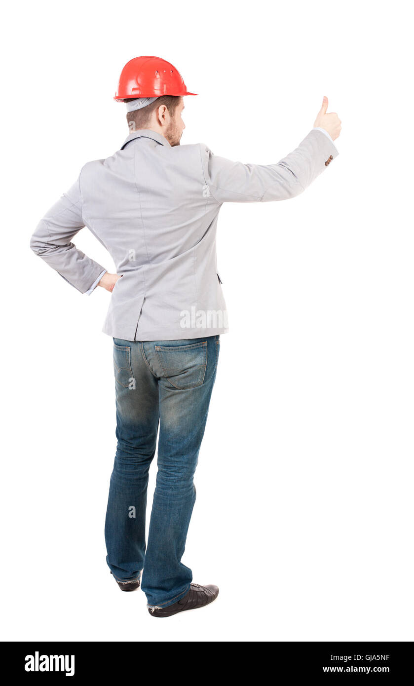 Back view of business man shows thumbs up Stock Photo - Alamy