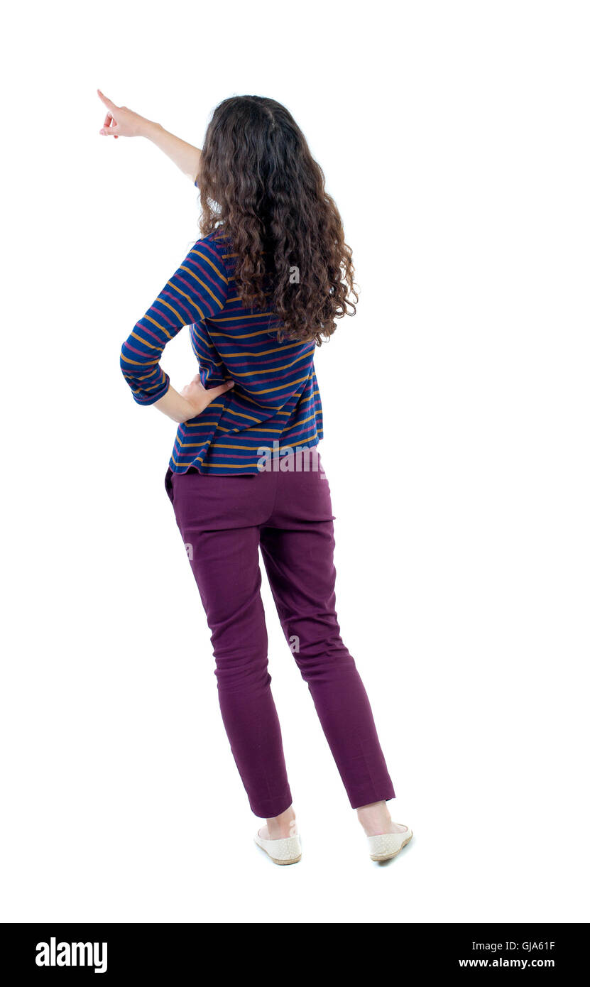 Back view of pointing woman. beautiful girl Stock Photo - Alamy
