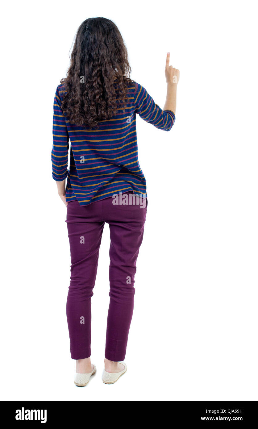 back view of woman presses down on something Stock Photo - Alamy