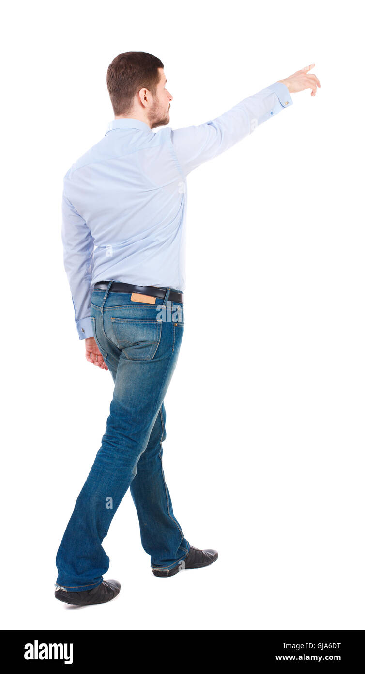 Back view of going business man pointing Stock Photo - Alamy