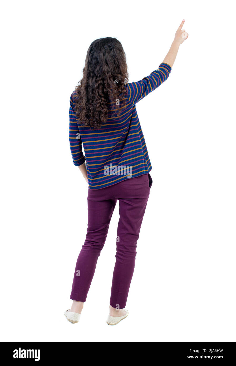 Back view of pointing woman. beautiful girl Stock Photo - Alamy