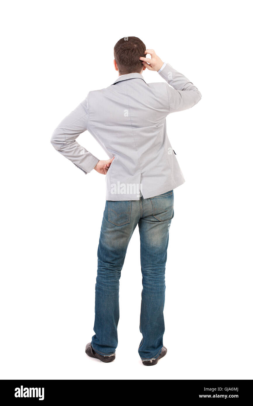 Back view of man . Standing young guy Stock Photo - Alamy