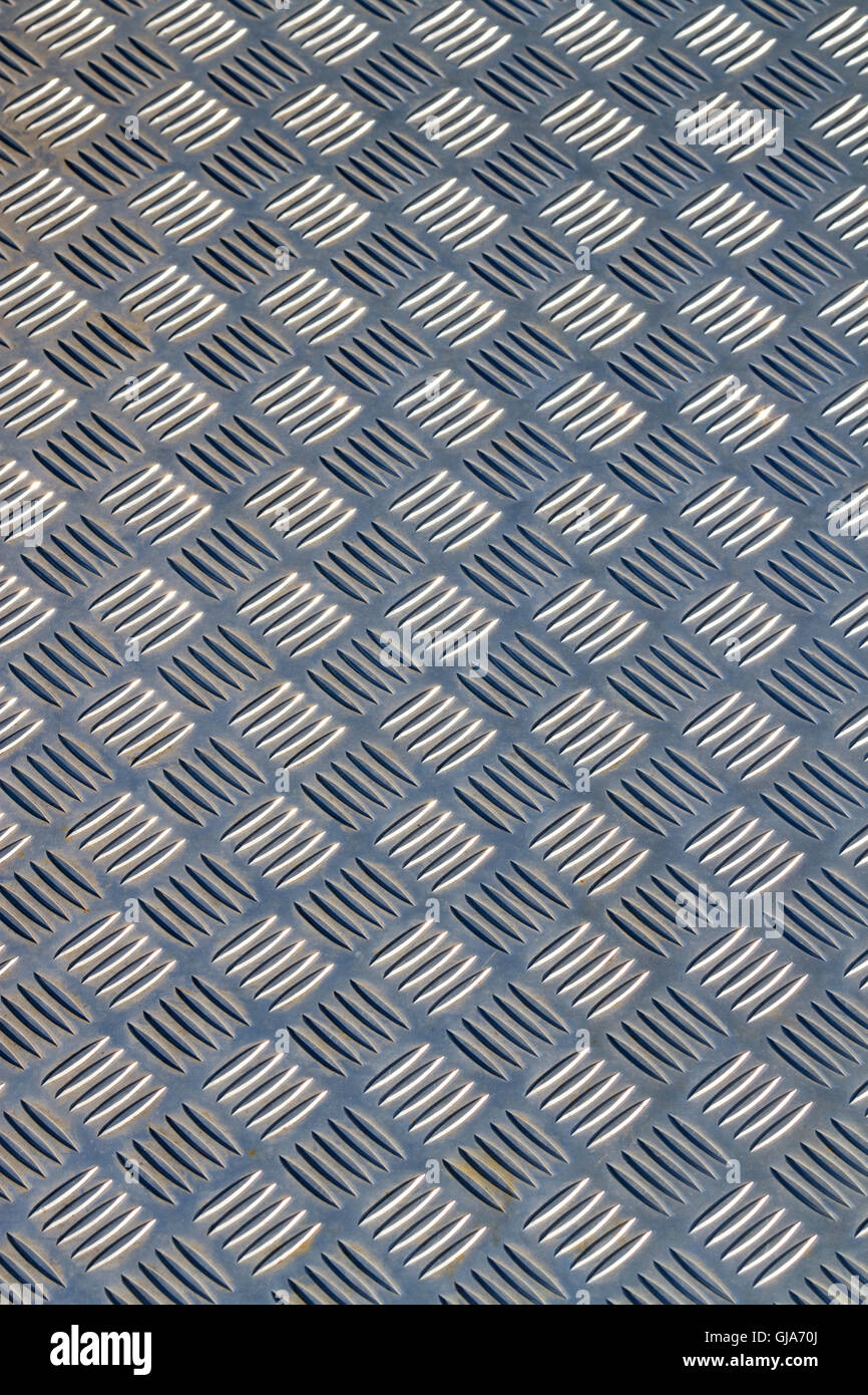 Scratched and dirty diamond plate background Stock Photo - Alamy
