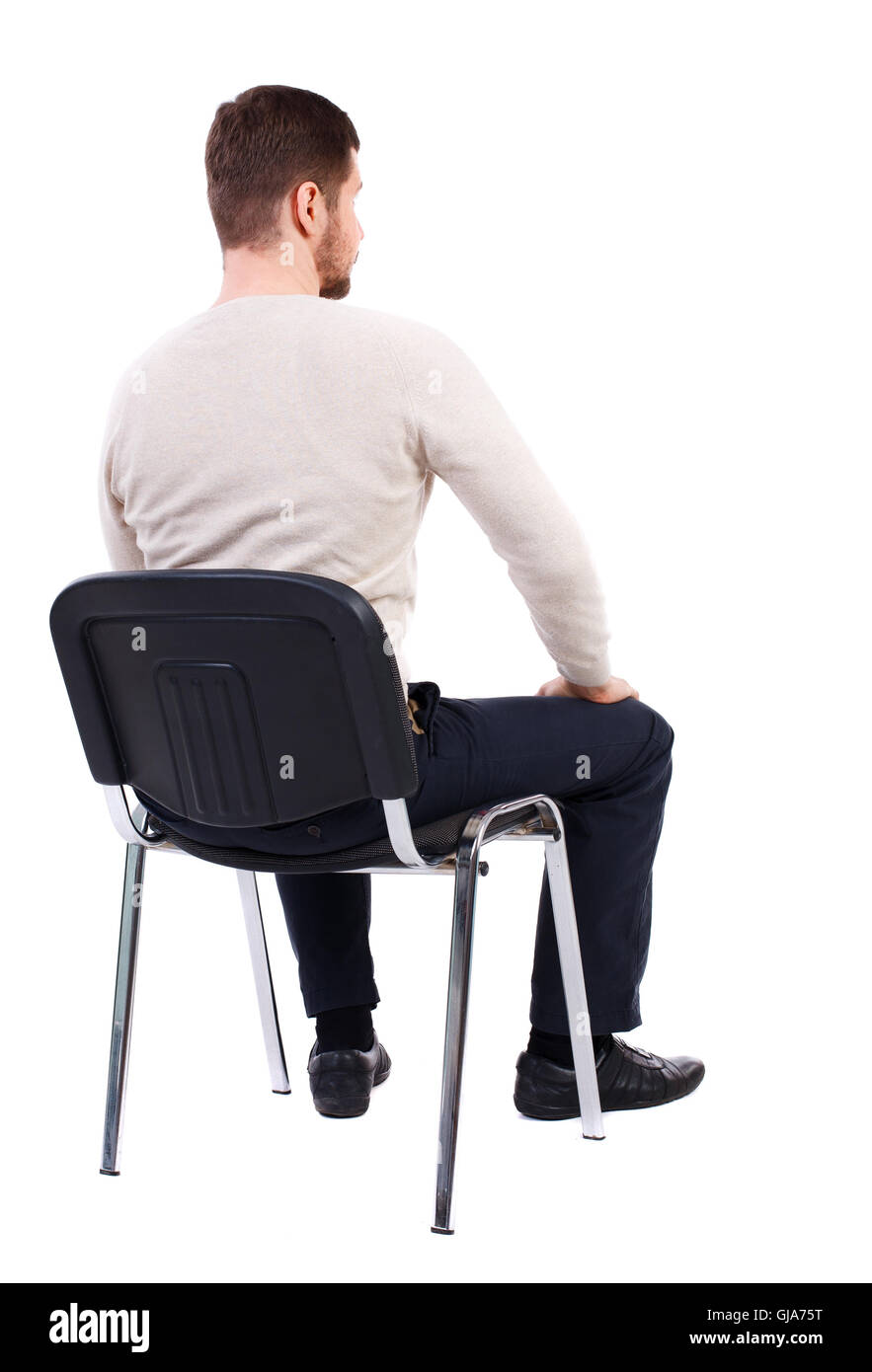 back view of business man sitting on chair Stock Photo - Alamy