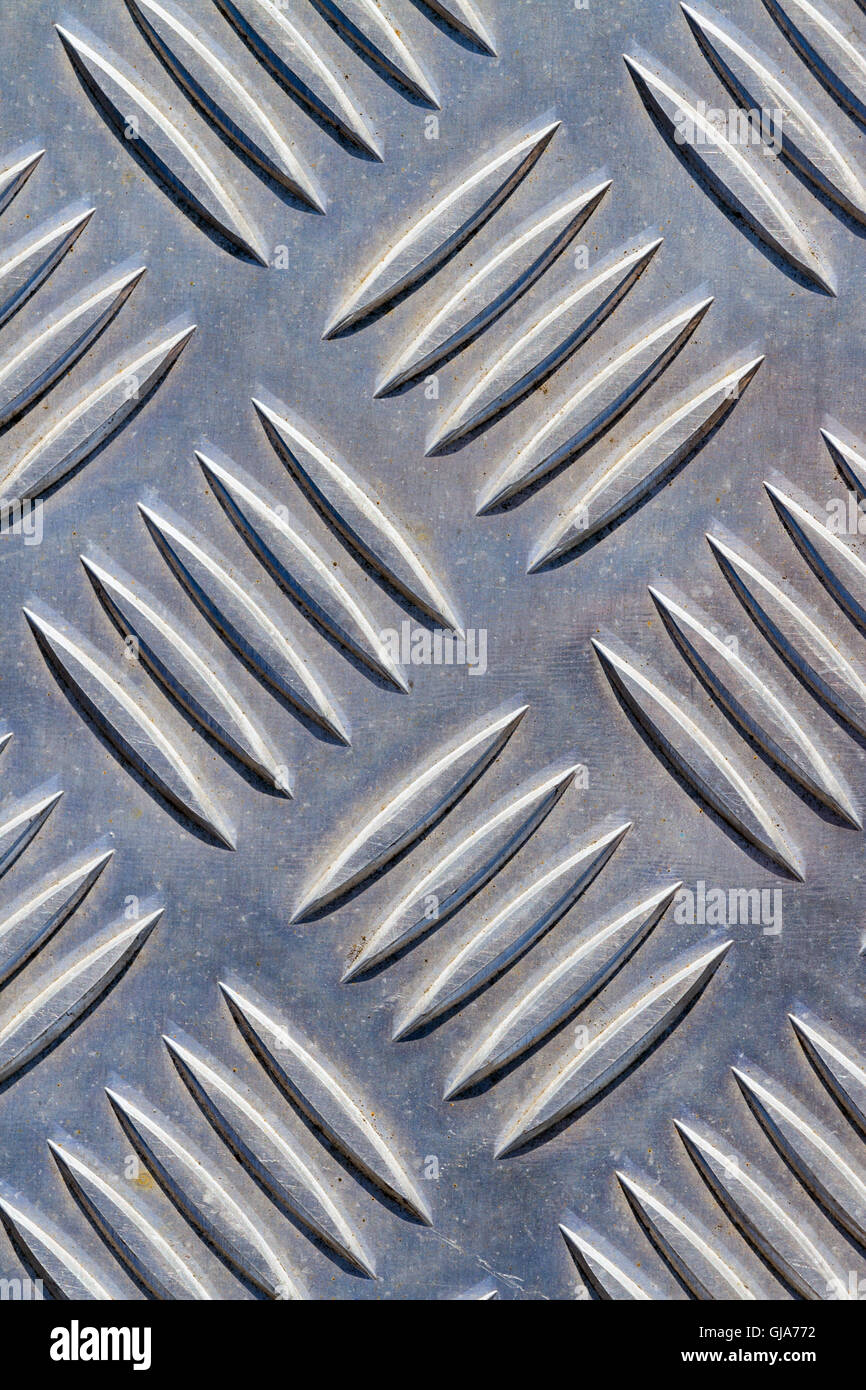 Scratched diamond plate steel background Stock Photo - Alamy