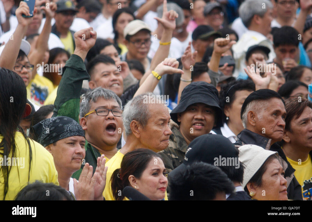 A Filipino shouts slogans during a citizens' assembly in Rizal Park ...