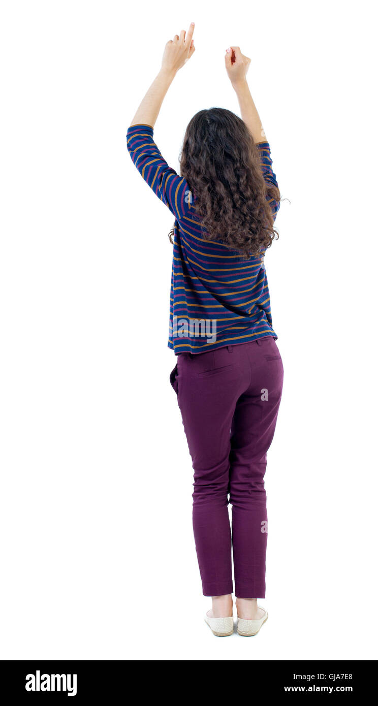 back view of dancing young beautiful woman. girl watching Stock Photo ...