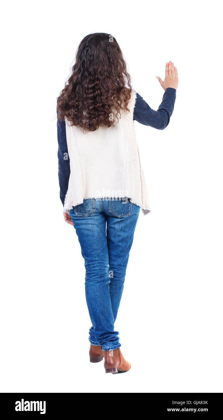 Back view of beautiful woman welcomes Stock Photo - Alamy