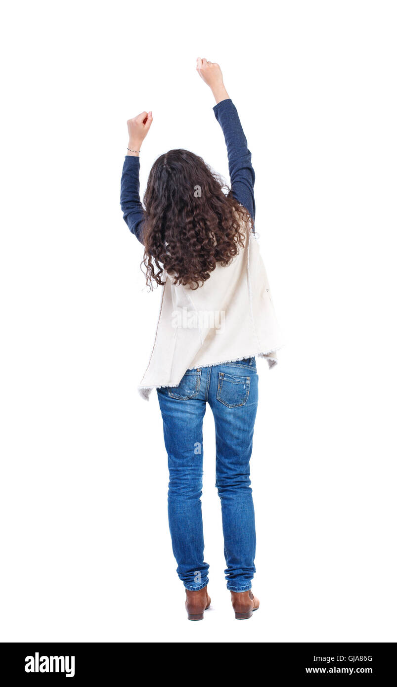 back view of dancing young beautiful woman. girl watching Stock Photo ...