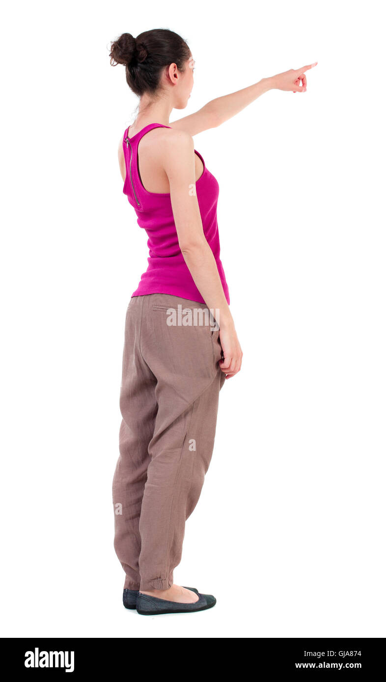 Back view of pointing woman. beautiful girl Stock Photo - Alamy