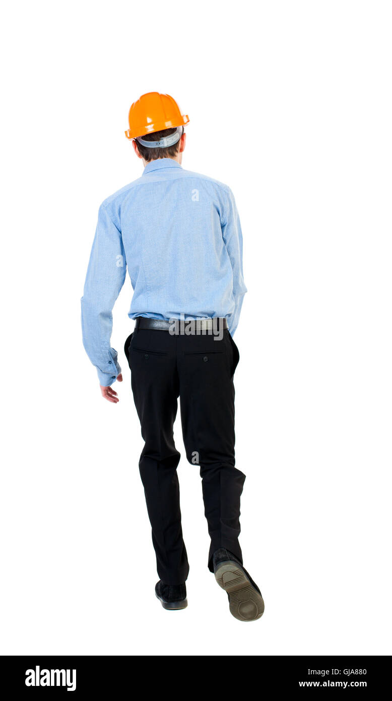 Back view of running engineer in helmet Stock Photo - Alamy