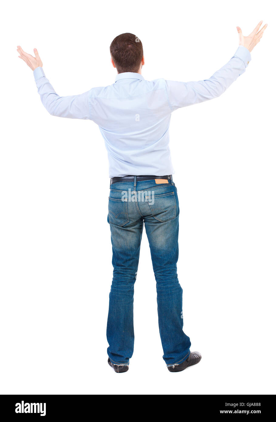 man in a jacket raised his hands in praye Stock Photo - Alamy