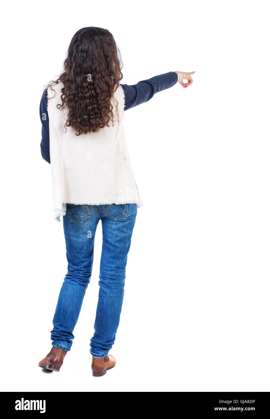 Back view of pointing woman. beautiful girl Stock Photo - Alamy