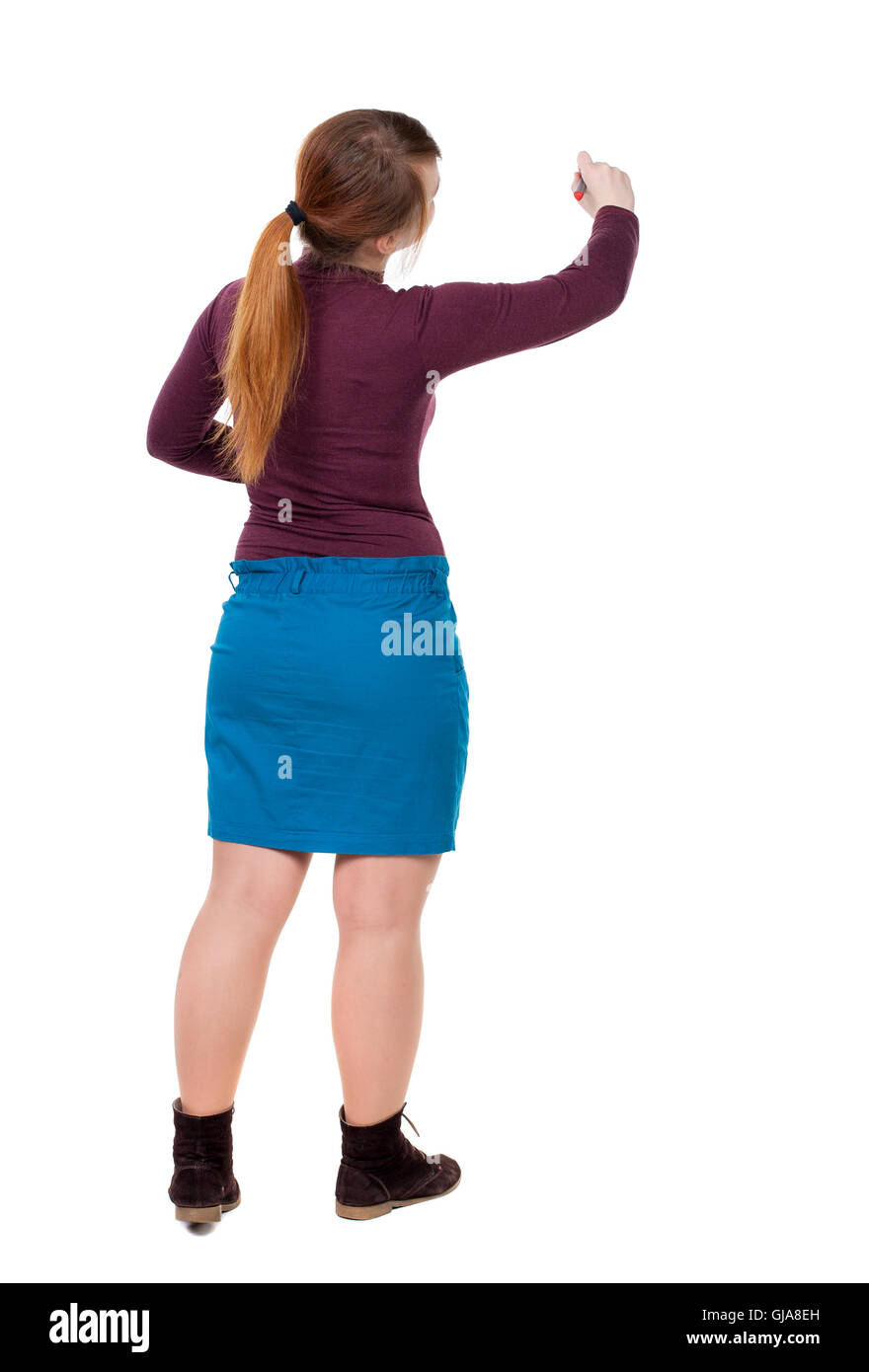 back view of writing beautiful woman. Young girl in dress Stock Photo ...