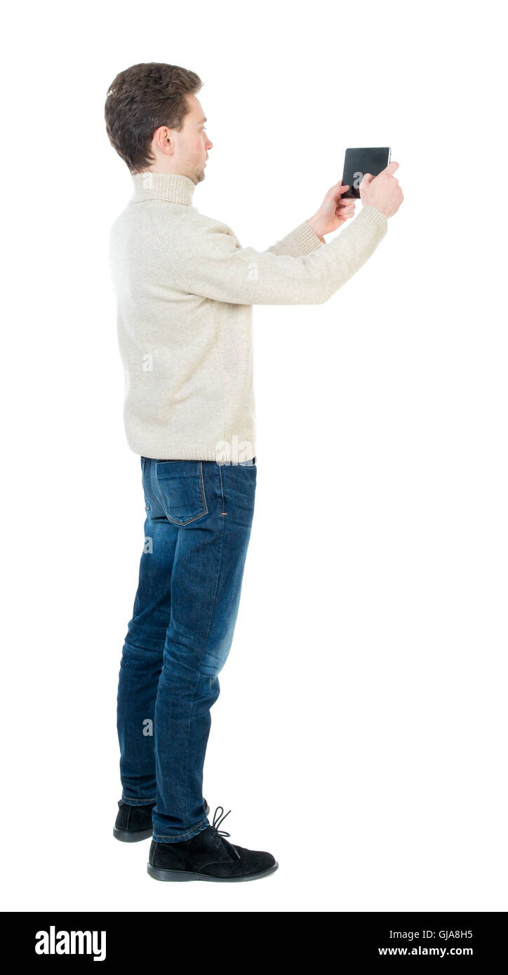 back view of standing business man photographing a phone or tabl Stock ...