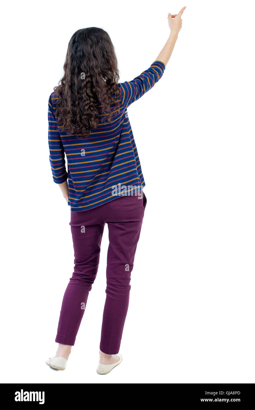 Back view of pointing woman. beautiful girl Stock Photo - Alamy