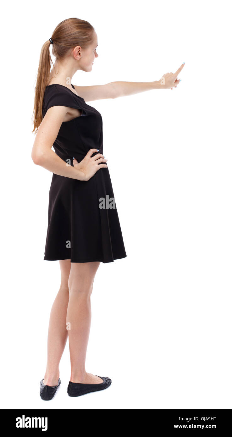 Back view of pointing woman. beautiful girl Stock Photo - Alamy