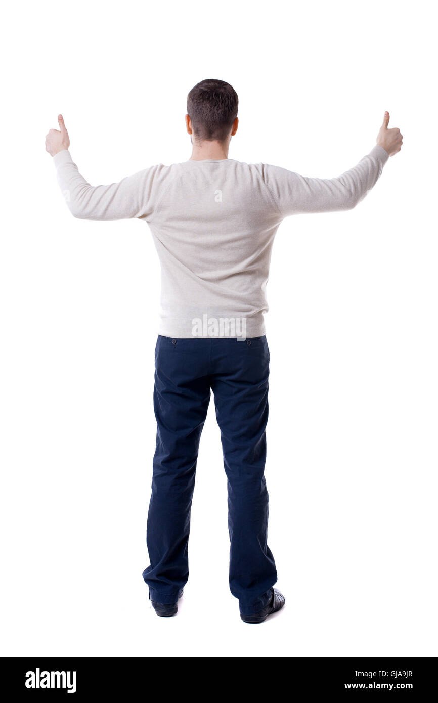 Back view of business man shows thumbs up Stock Photo - Alamy