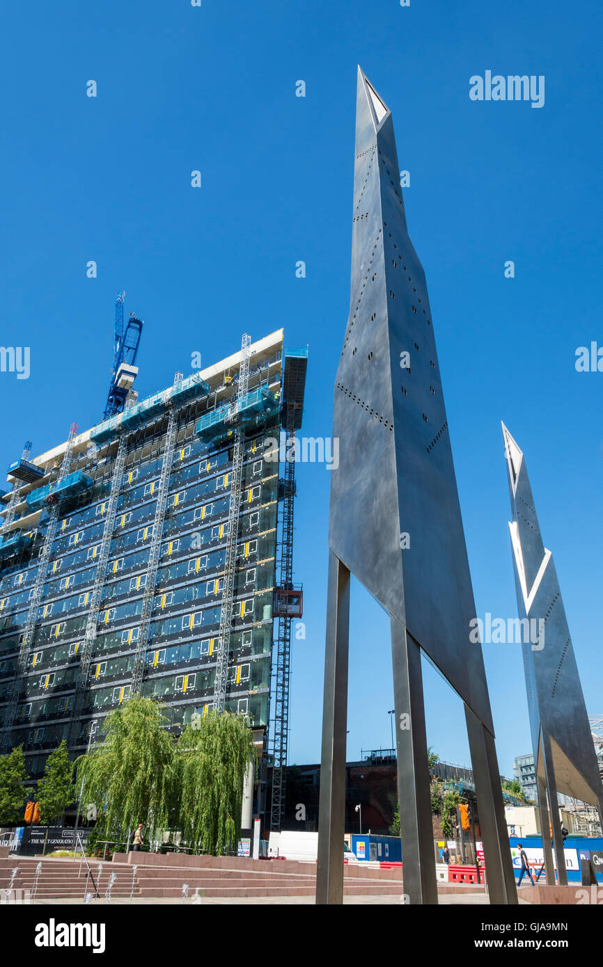 The CitySuites apartment block under construction with metallic ...