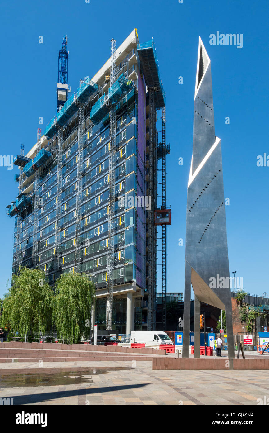 The CitySuites apartment block under construction, with metallic ...
