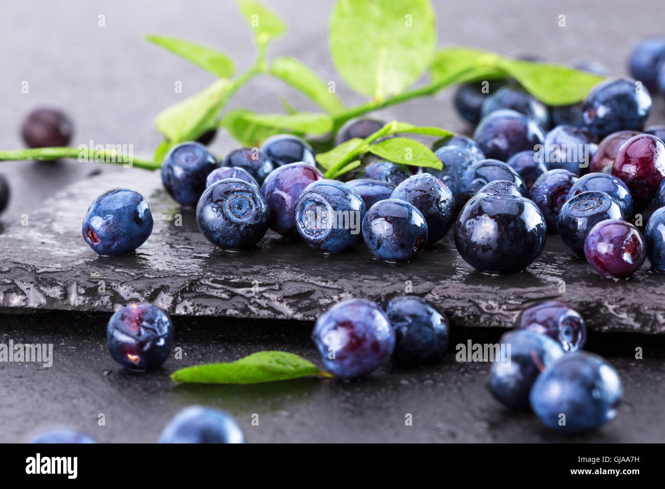 blueberries on a slate table Stock Photo - Alamy