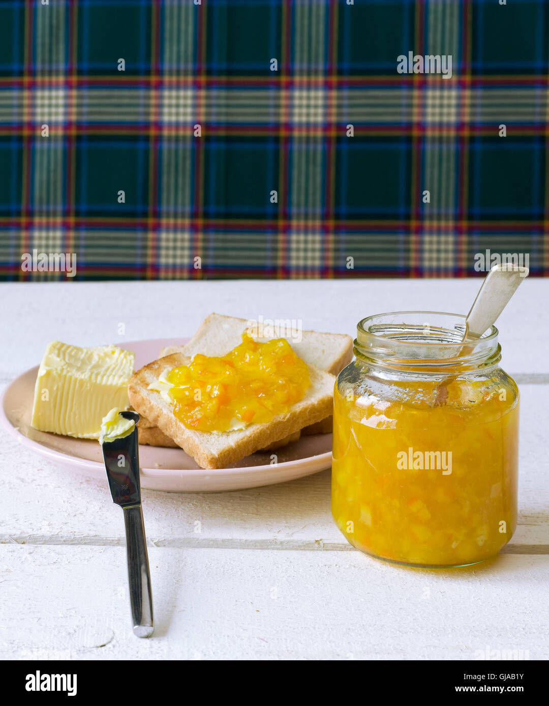 Toast and orange marmalade Stock Photo - Alamy