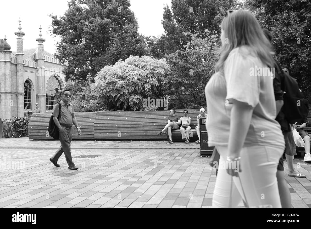 People walking past Black and White Stock Photos & Images - Alamy