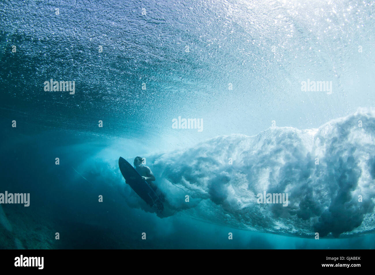 Surfer diving under wave hi-res stock photography and images - Alamy