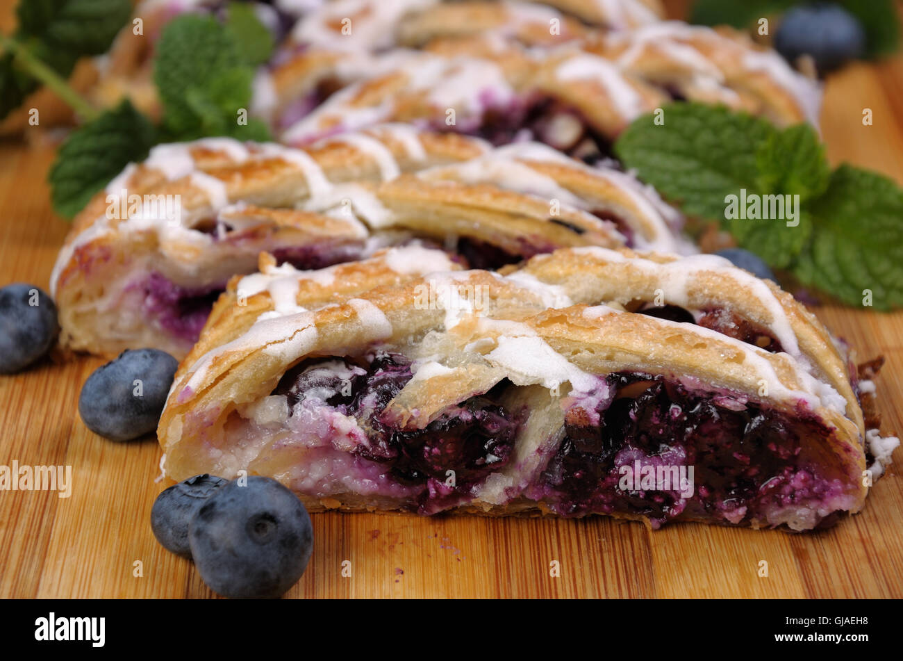 Pie stuffed with cheese cream , blueberry, crushed peanuts dough ...