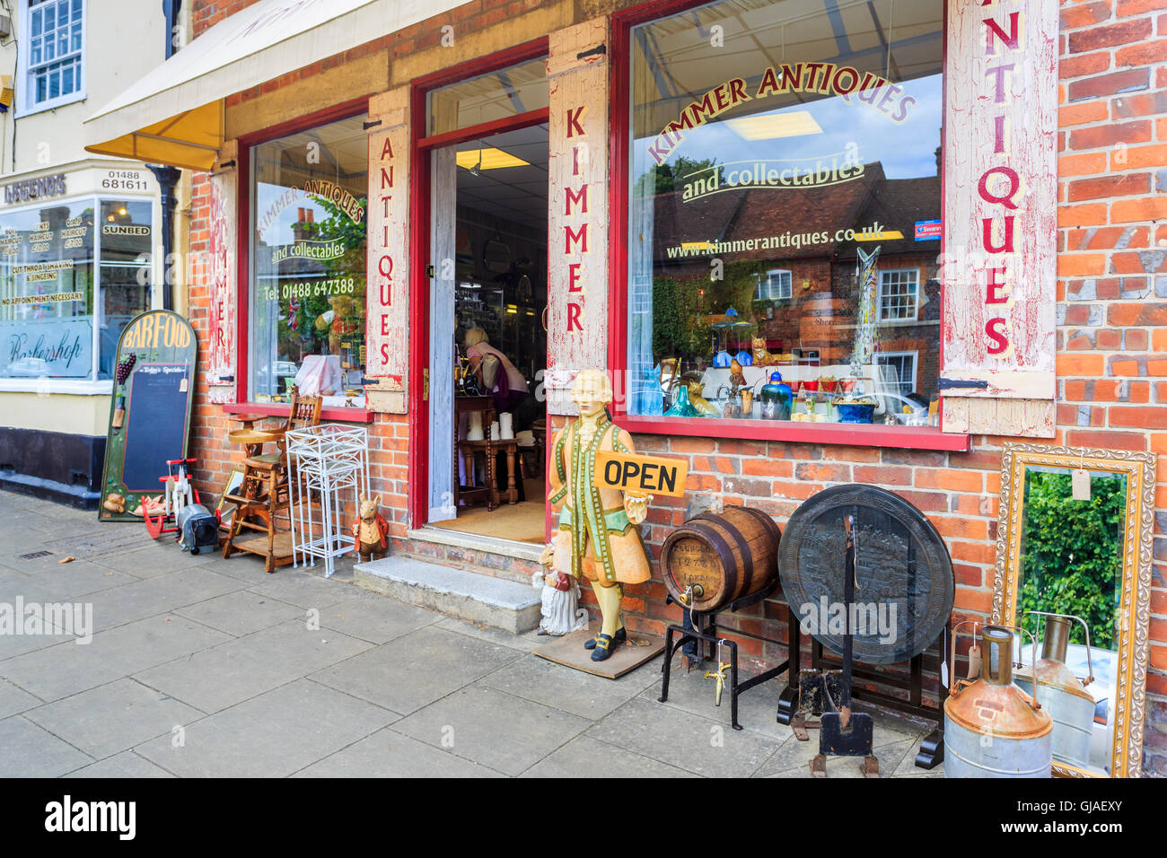 Shop front and windows of Kimmer Antiques, a small antique shop in High ...