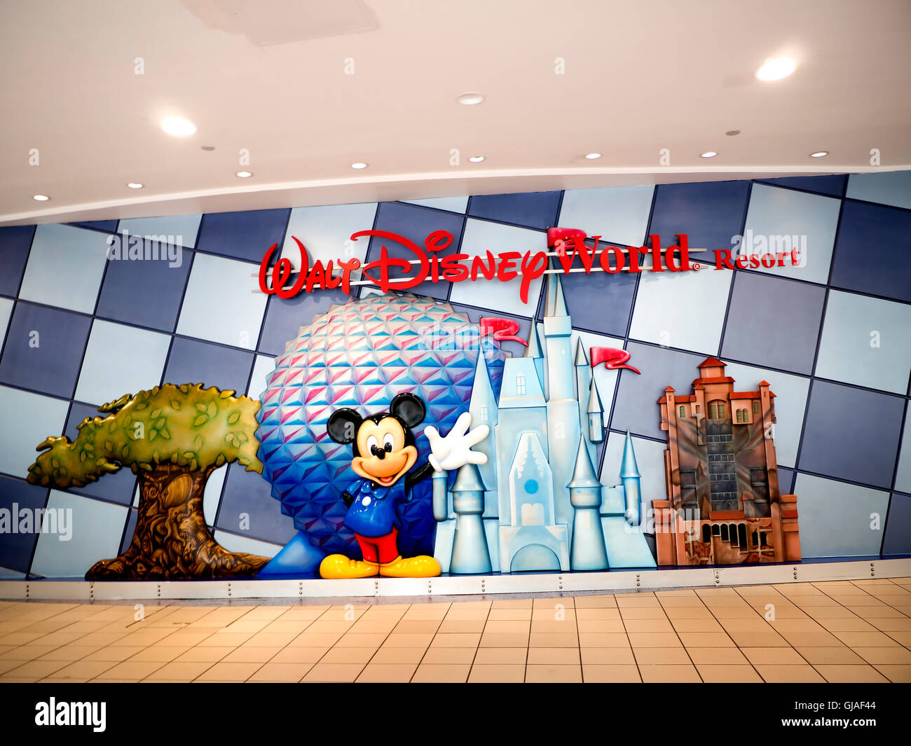 Mickey waving goodbye to passengers in the foyer and concourse of the ...