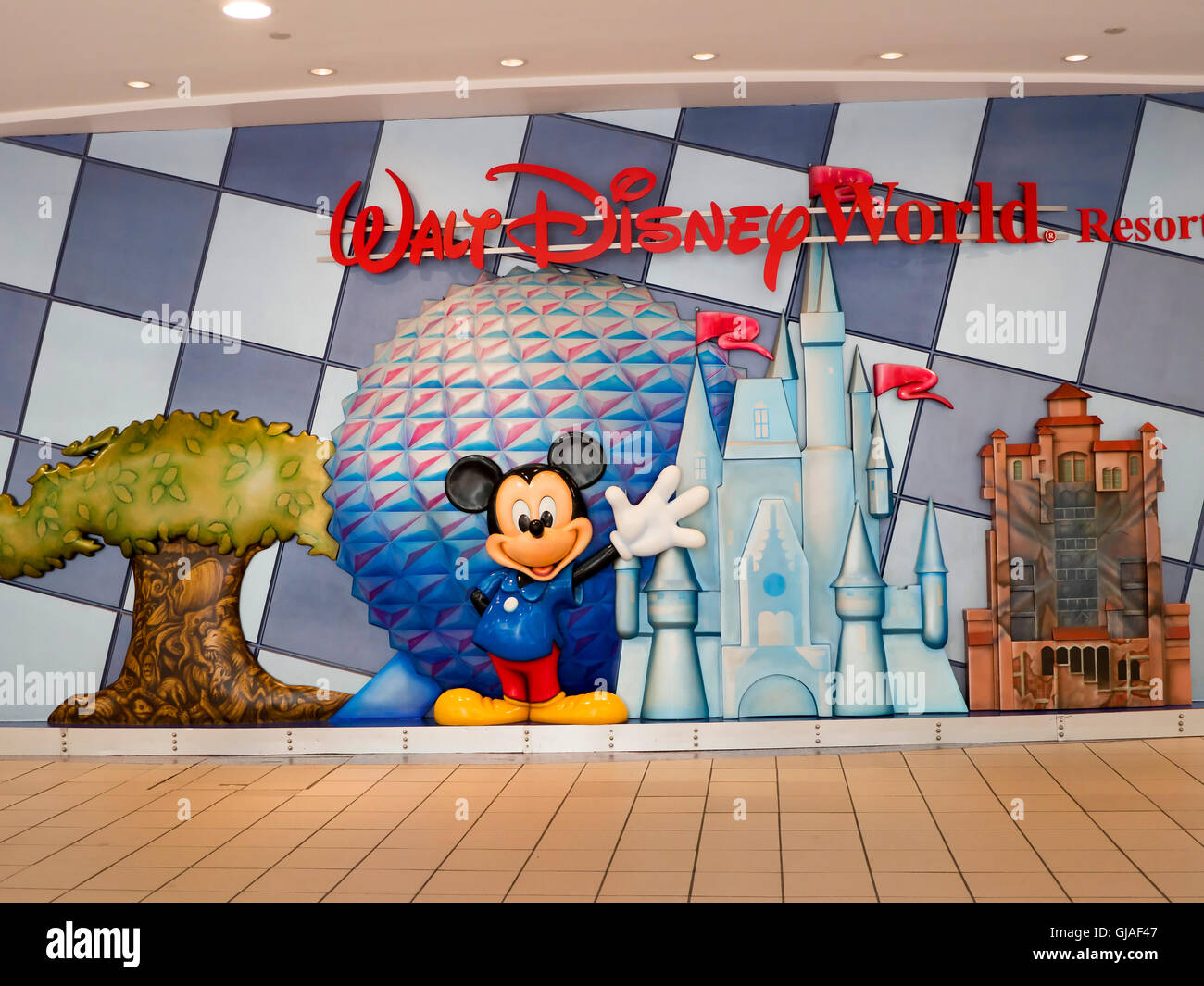 Mickey waving goodbye to passengers in the foyer and concourse of the ...