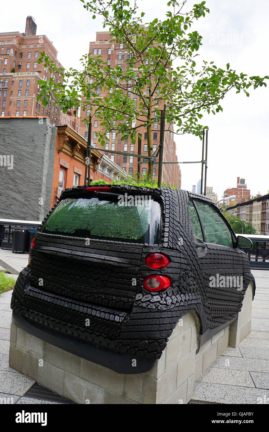 Car shape planter made with recycled rubber tires dispayed at the High ...