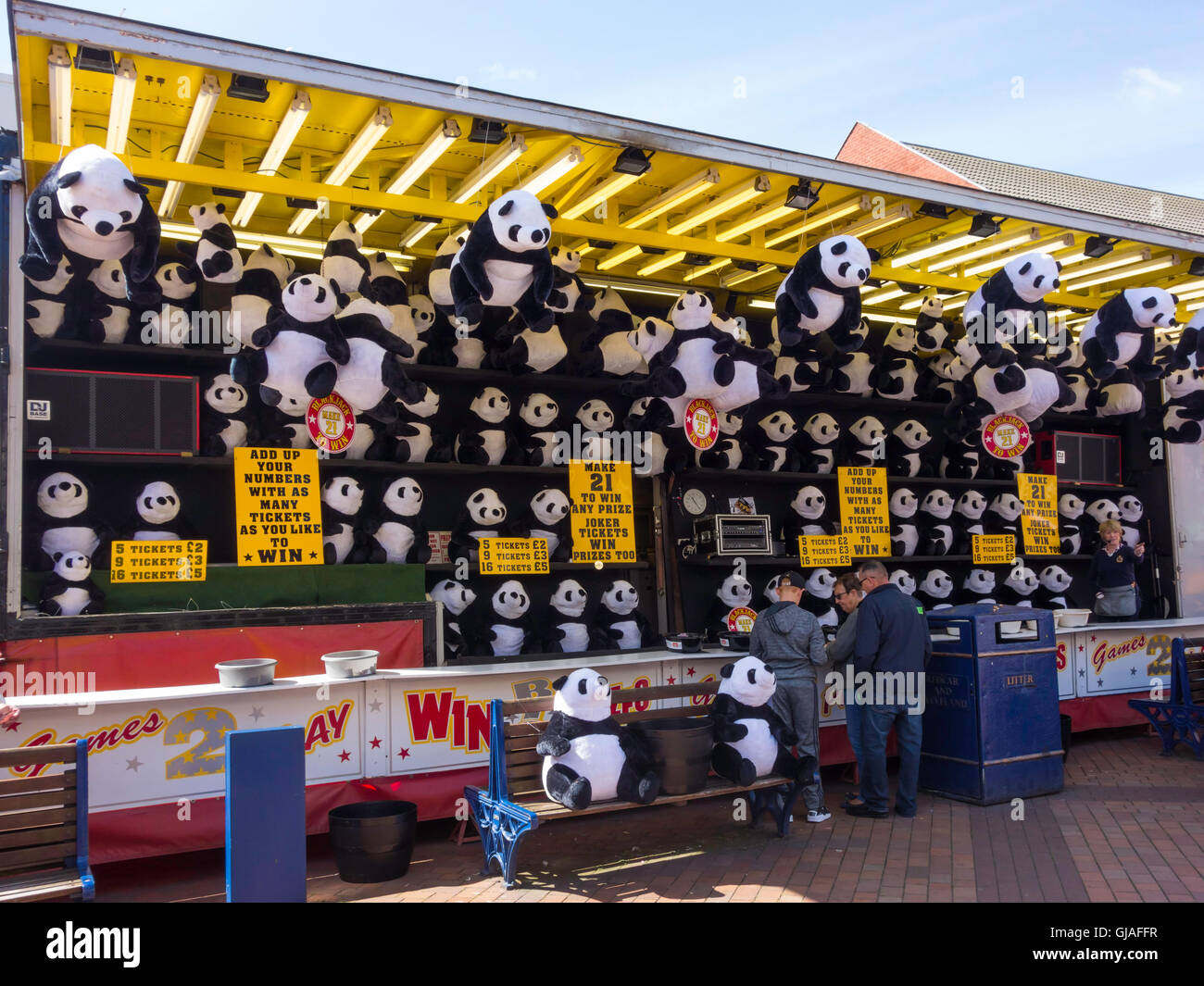 Fair ground stall offering large Panda soft toys as prizes Stock Photo ...