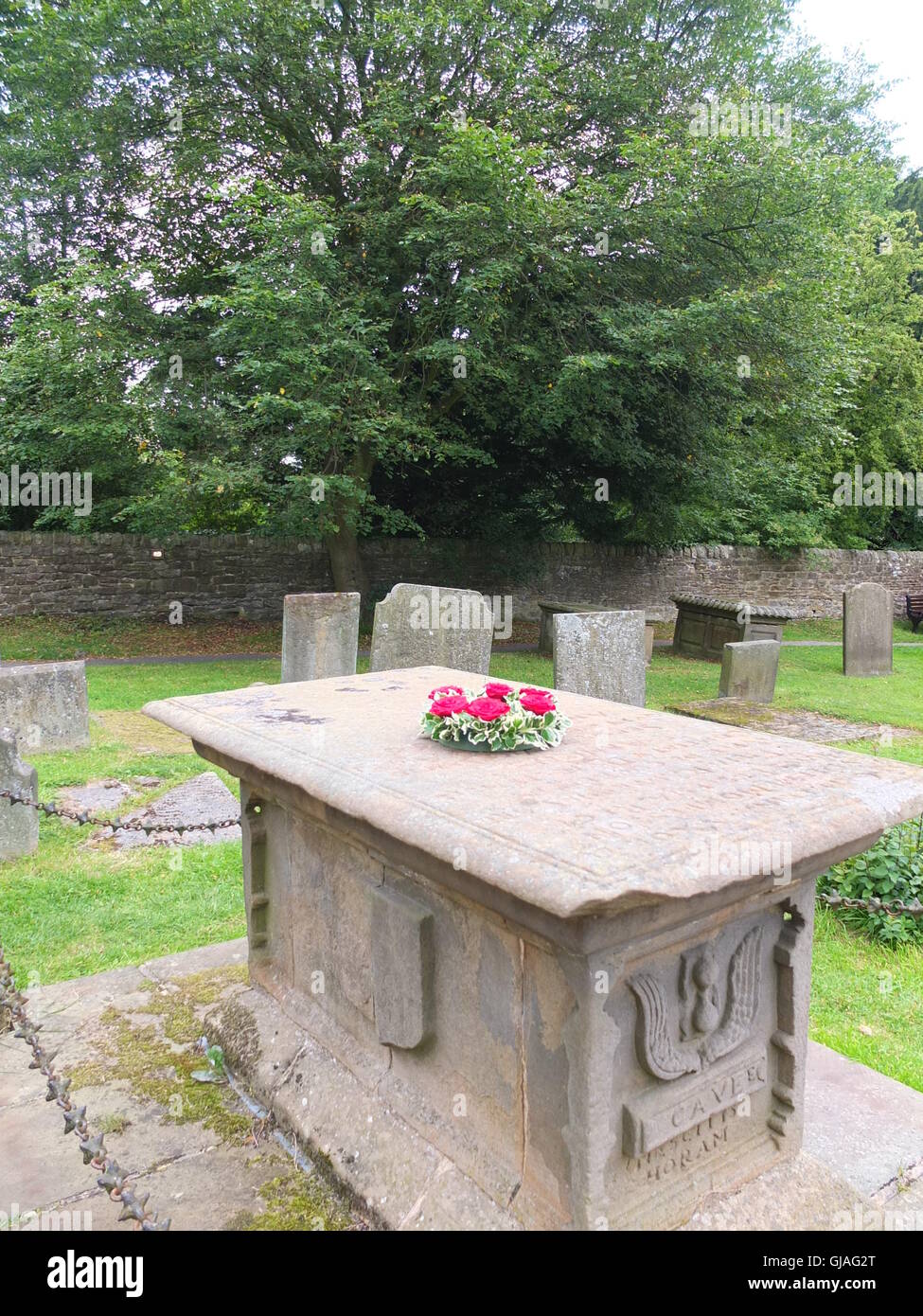 A wreath of red roses is laid on the grave of Catherine Mompesson prior ...