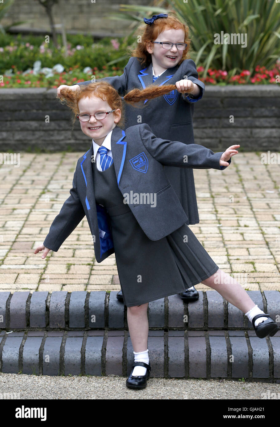 Caragh (back) and Sophie Doig (5), one of 15 sets of twins from the ...
