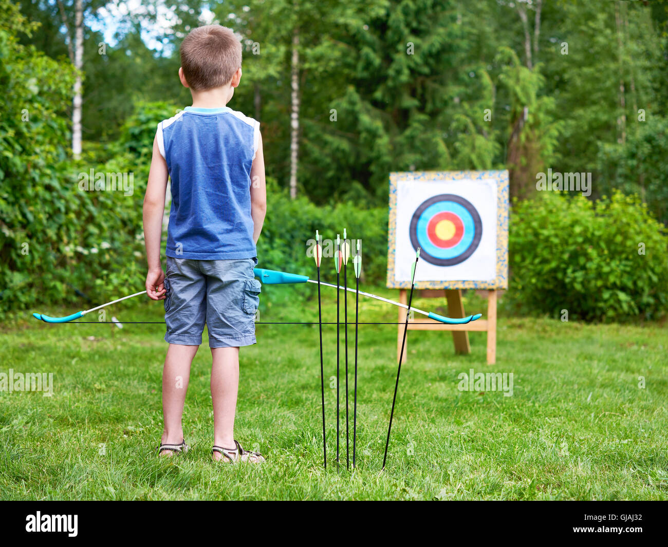 Boy with bow hi-res stock photography and images - Alamy