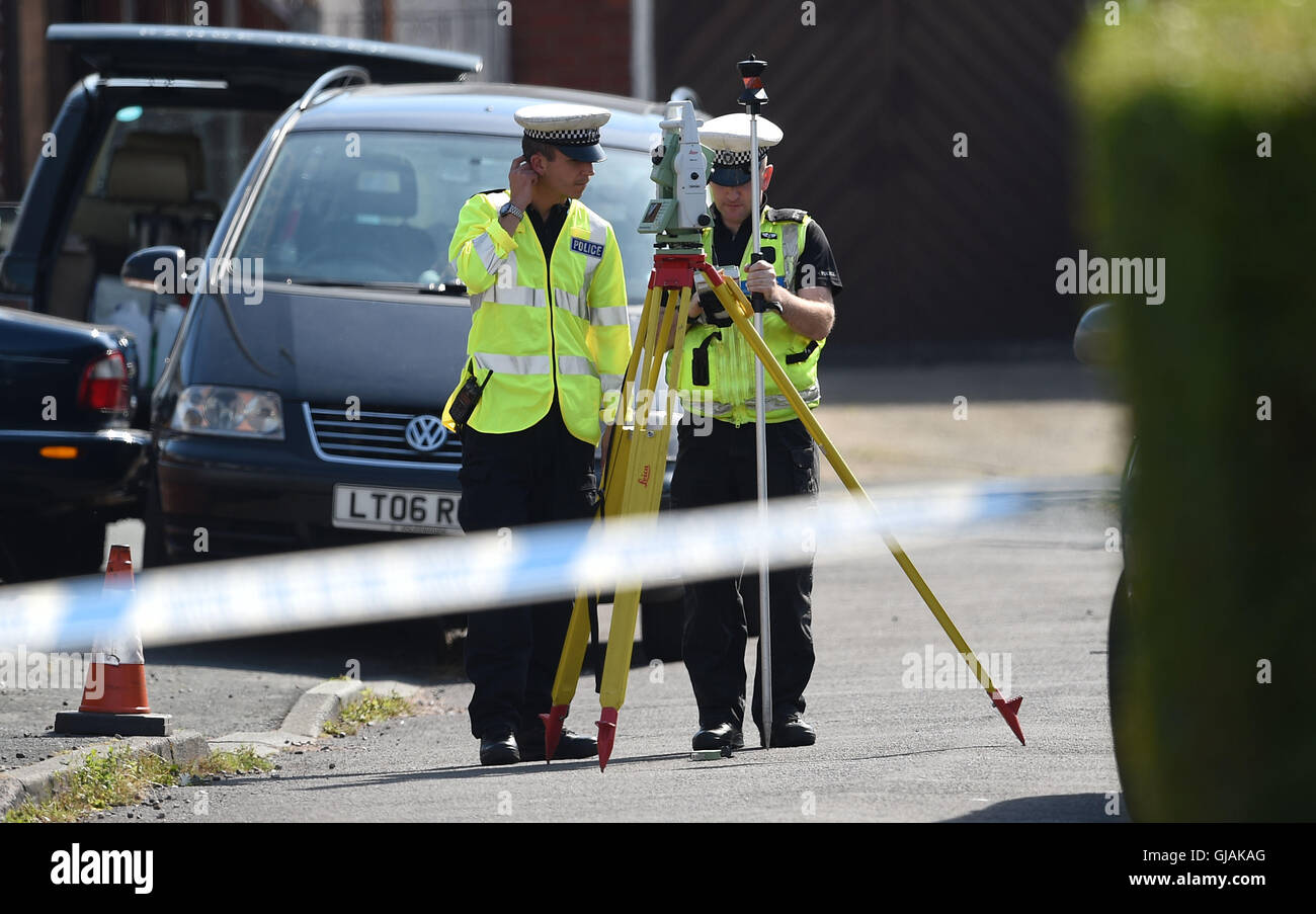 Police survey the scene in Meadow Close in the Trench area of Telford ...