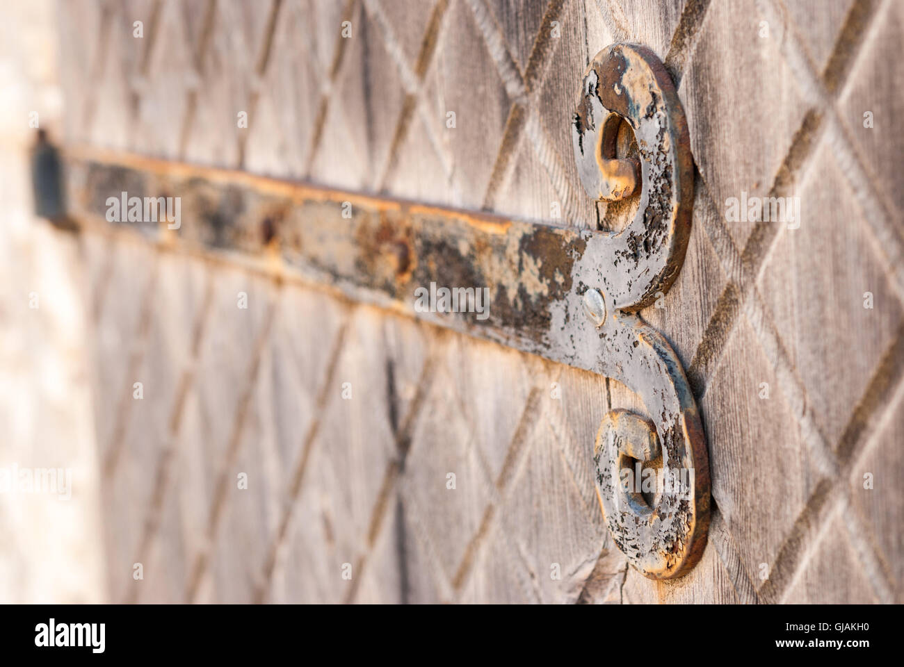Old rustic shabby rusted hinges closeup Stock Photo - Alamy