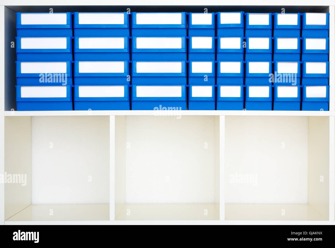 Shelf with boxes Stock Photo - Alamy
