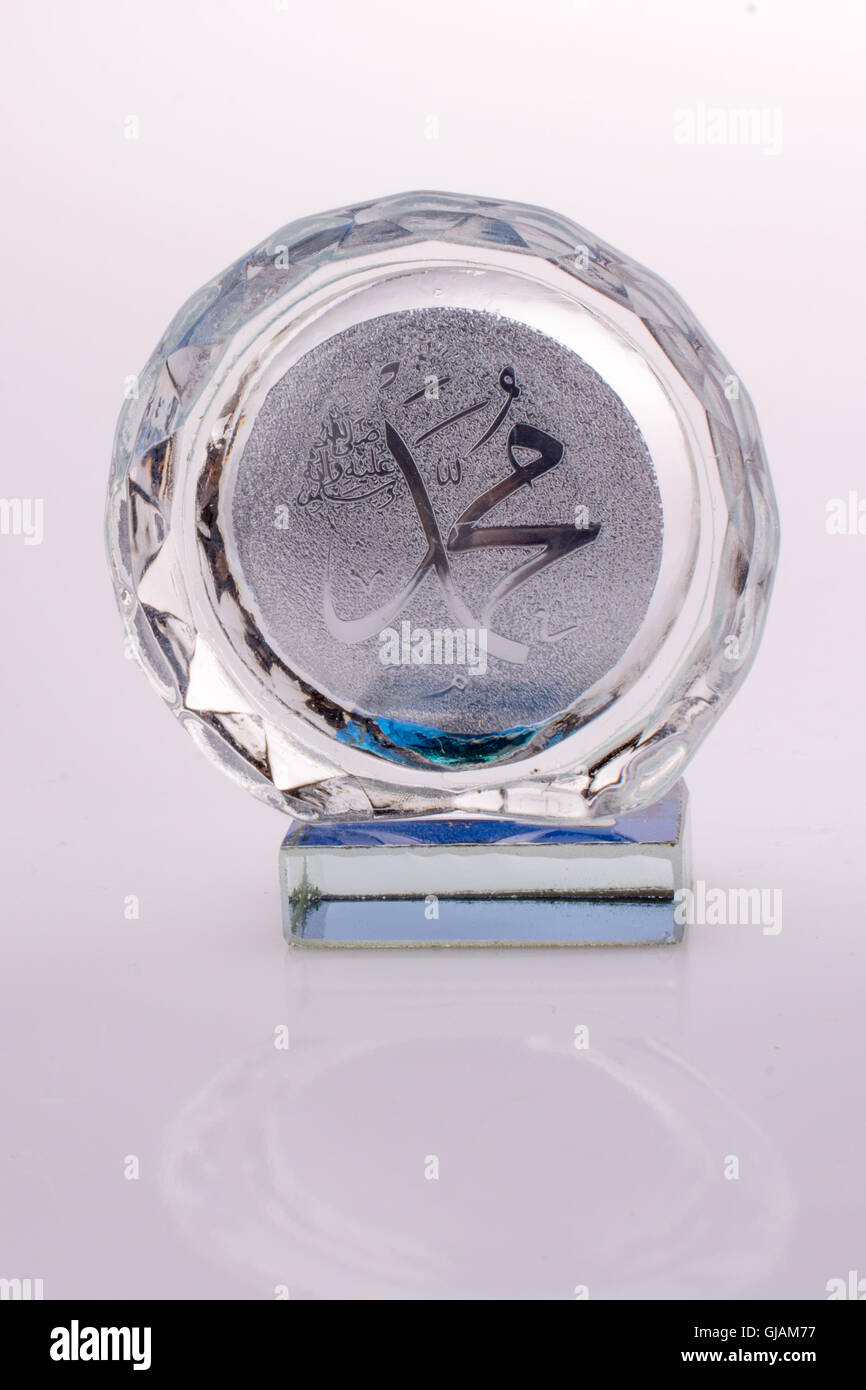 Miniature Holy Quran on a white background Stock Photo - Alamy